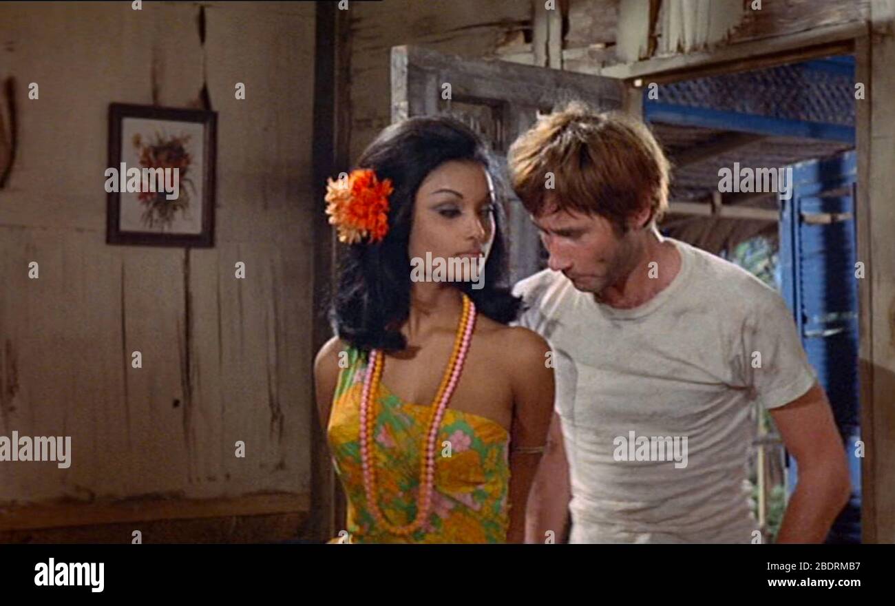 London.UK. Shakira Caine (then Shakira Baksh) and Jim Dale in a scene ...