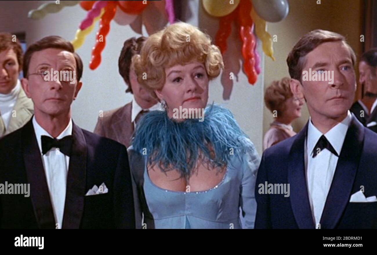 London.UK. Charles Hawtrey, Joan Sims and Kenneth Williams in a scene ...