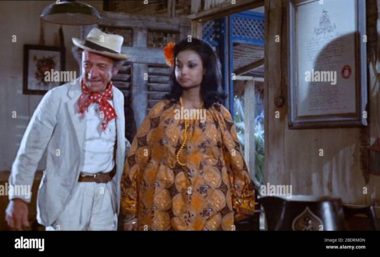 London.UK. Sid James and Shakira Caine (then Shakira Baksh) in a scene ...