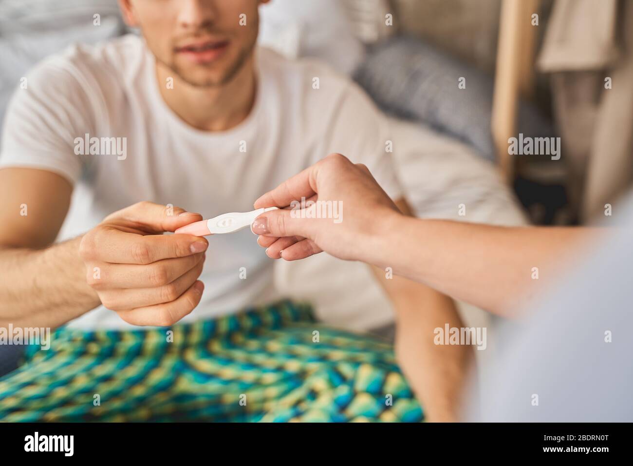 Focused photo on male hand that taking test Stock Photo - Alamy