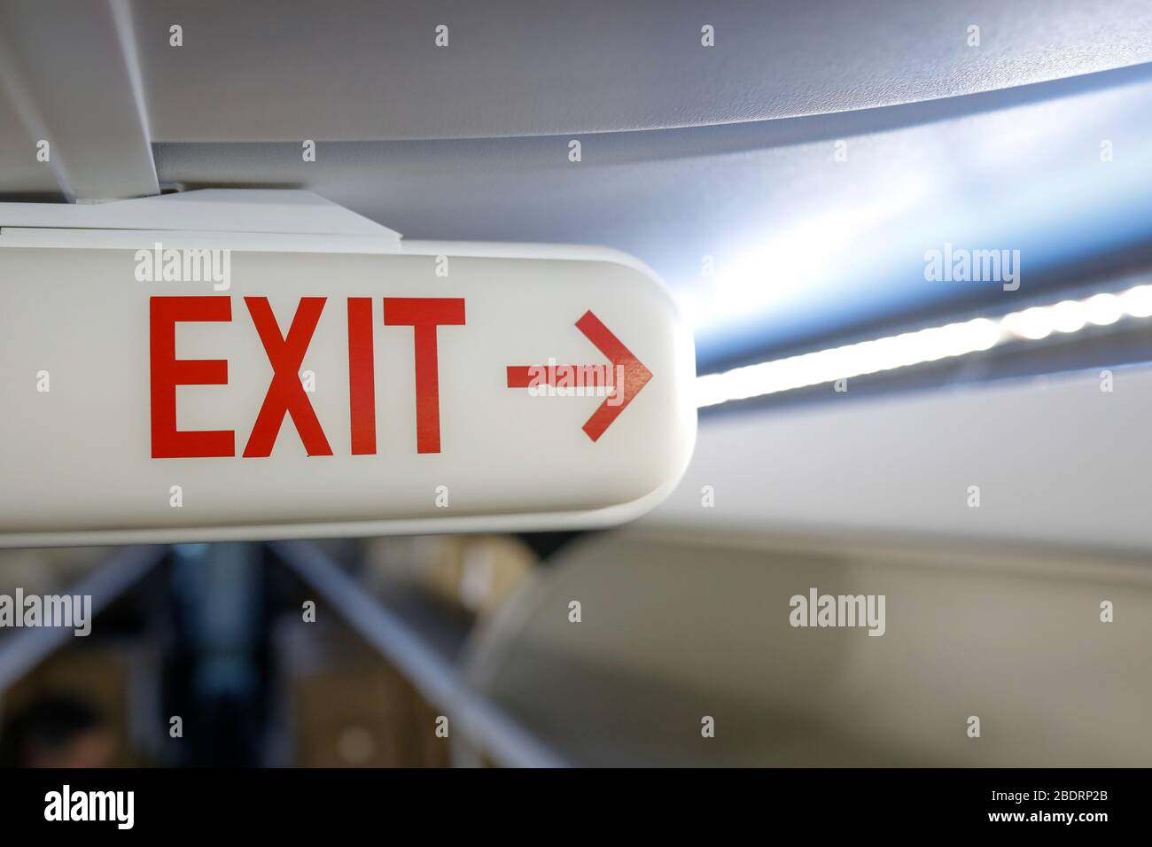 Shallow depth of field image (selective focus) with the exit sign on ...