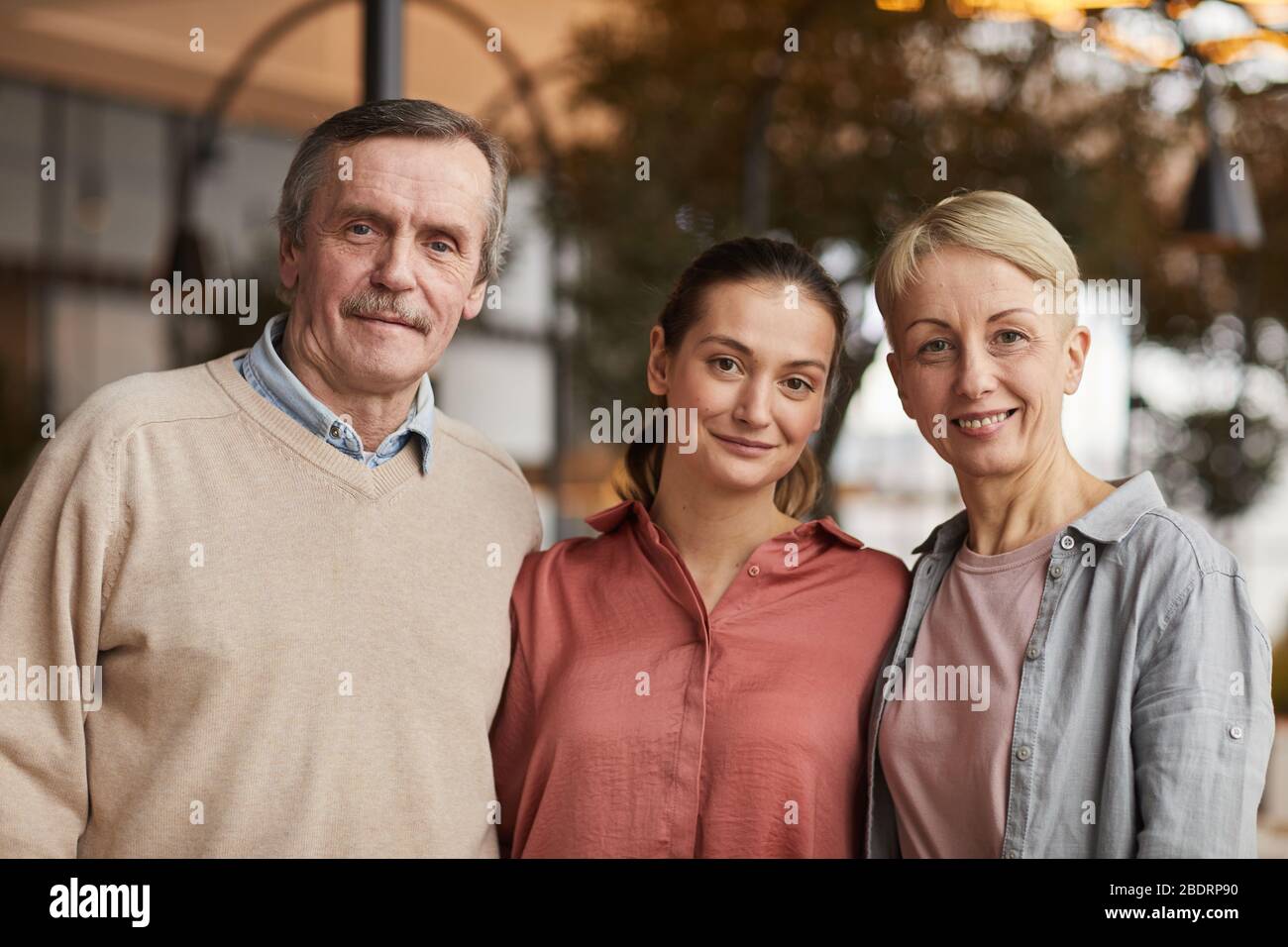 Portrait daughter standing parents hi-res stock photography and images ...
