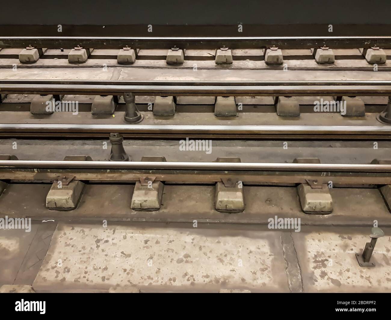 Railroad track , metro line detail Stock Photo - Alamy