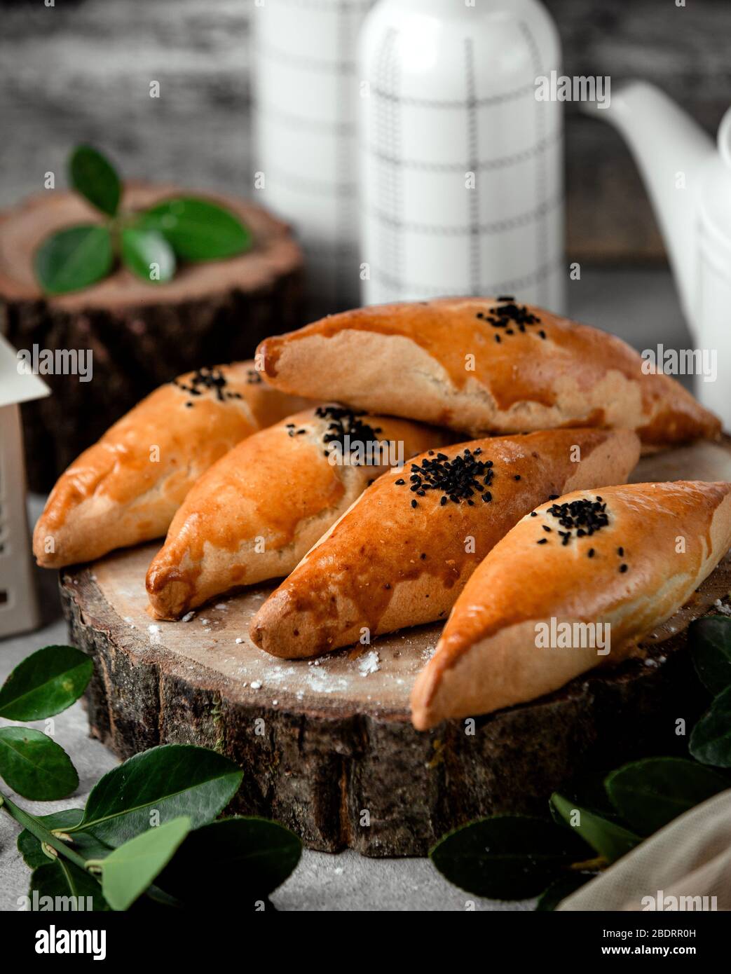 azerbaijani pastry filled with minced meat and garnished with black ...