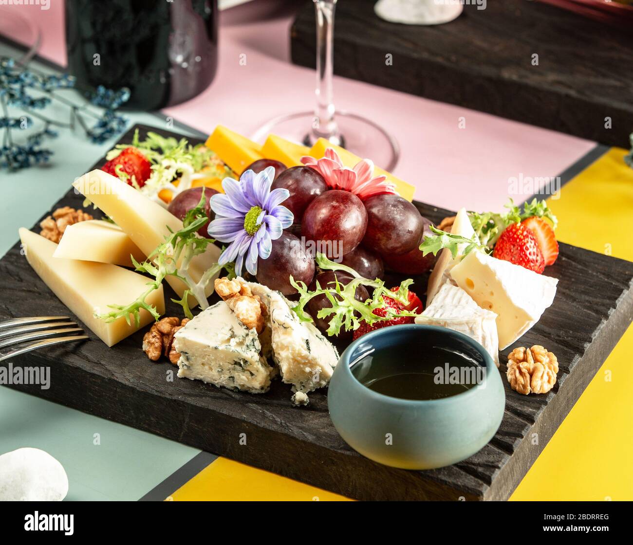 cheese platter with parmesan cheddar white and blue cheese nuts and ...