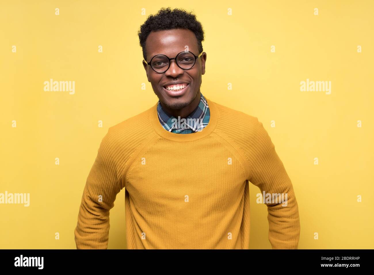 Smiling face young african man hi-res stock photography and images - Alamy