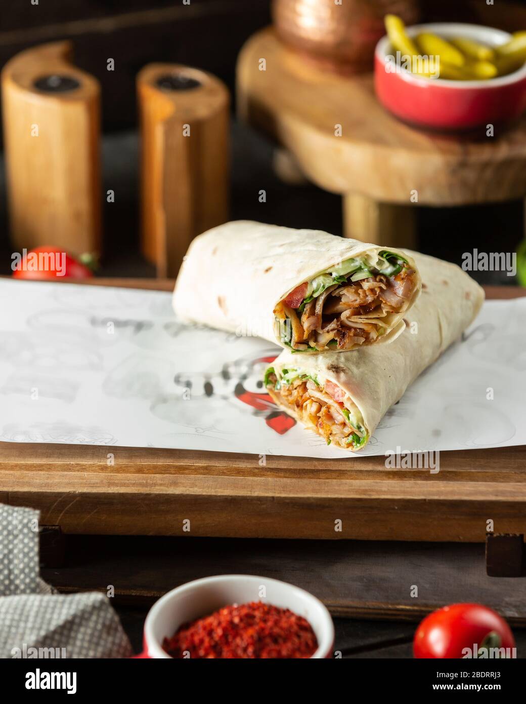 chicken doner wrap in flatbread with lettuce tomato and cucumber Stock ...