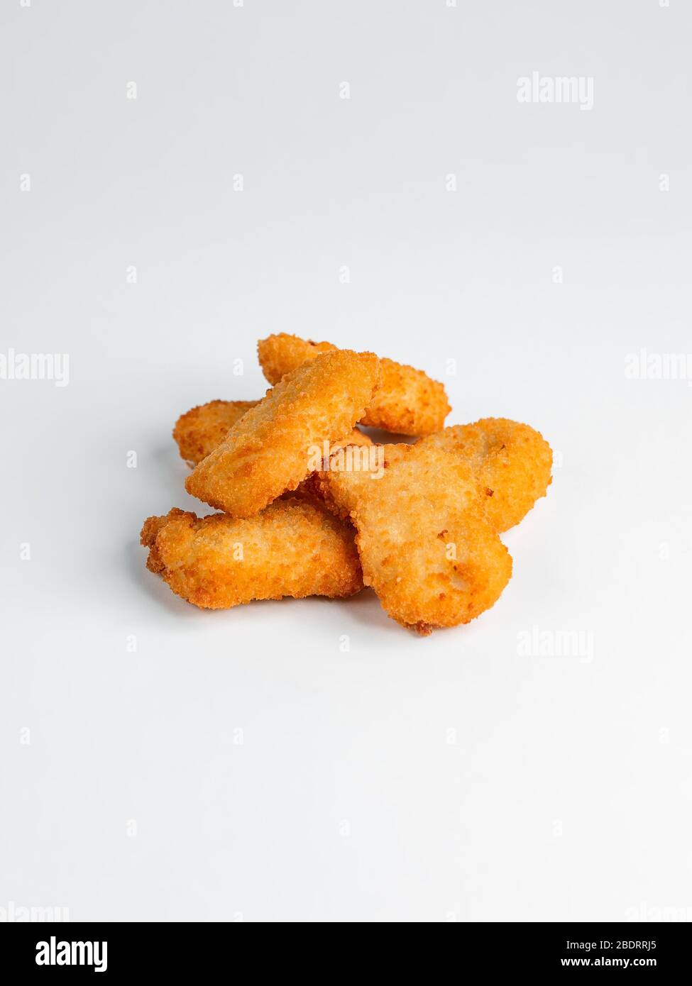 chicken nuggets in white background Stock Photo - Alamy