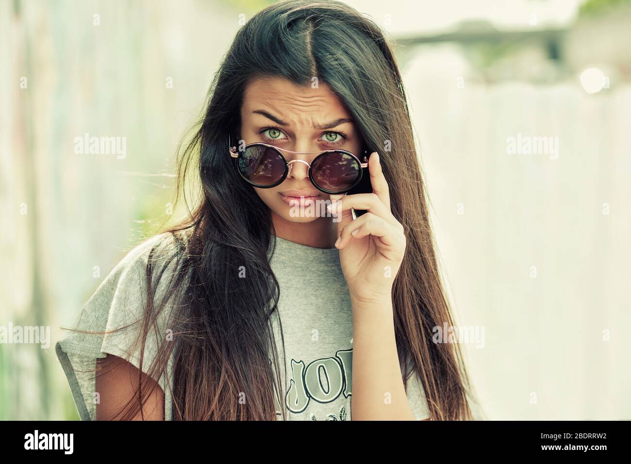 Closeup portrait beautiful young woman, lady looking at you camera over ...