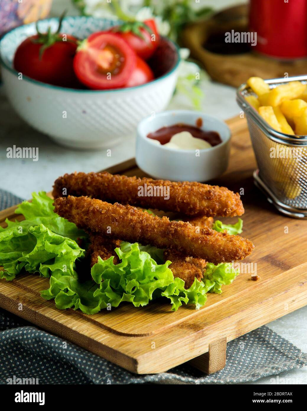 finger chicken nuggets served with french fries Stock Photo - Alamy