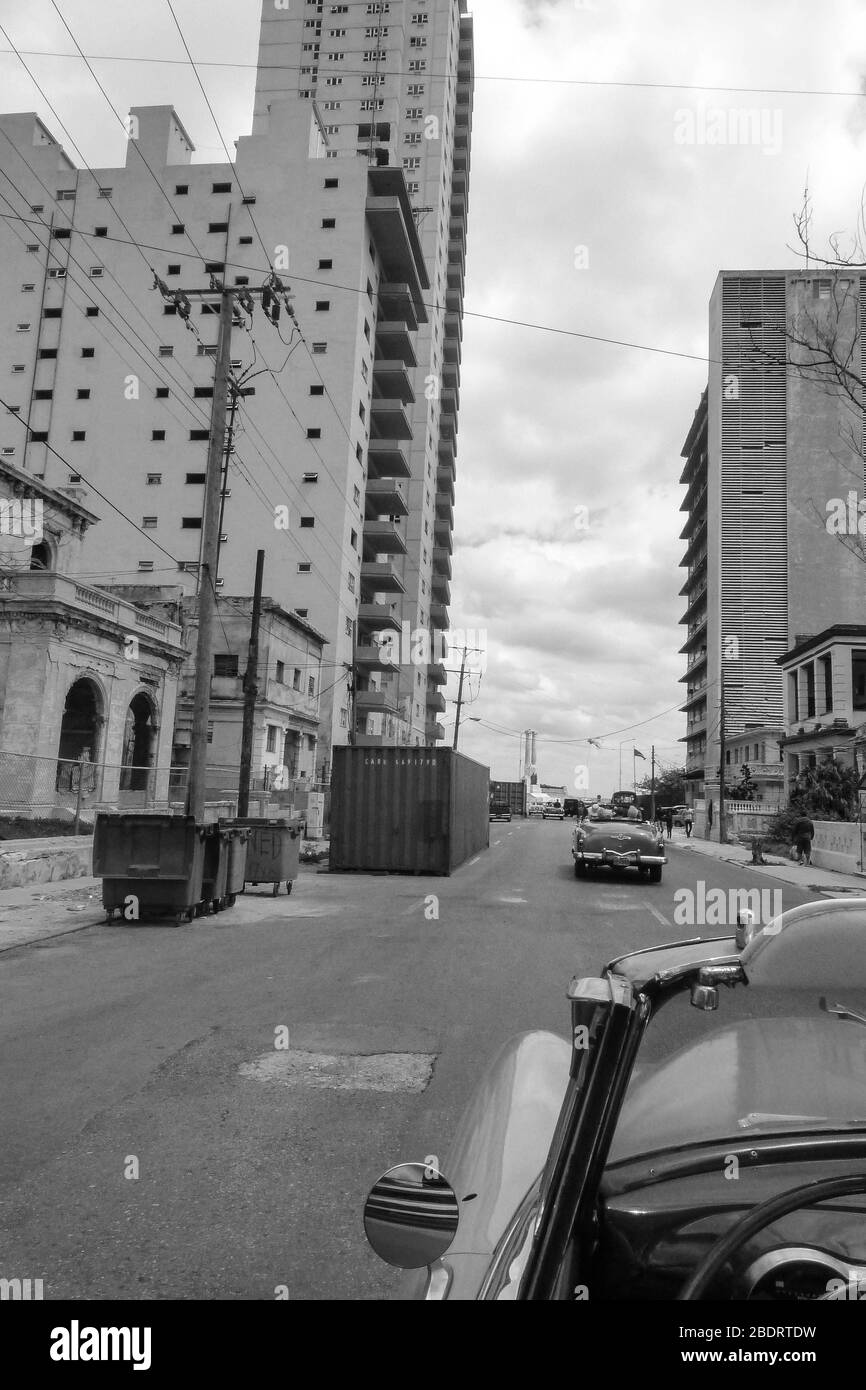Cuba Havana road bins bin electricity wires cables tall building ...