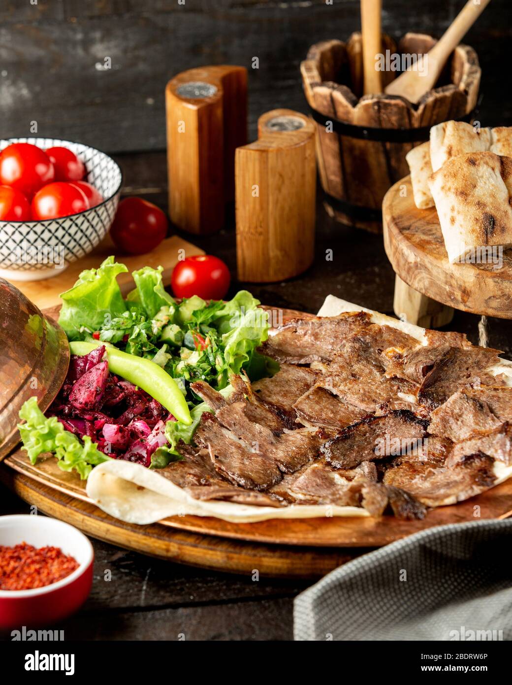 lamb doner slices served with vegetable salad and flatbread Stock Photo ...