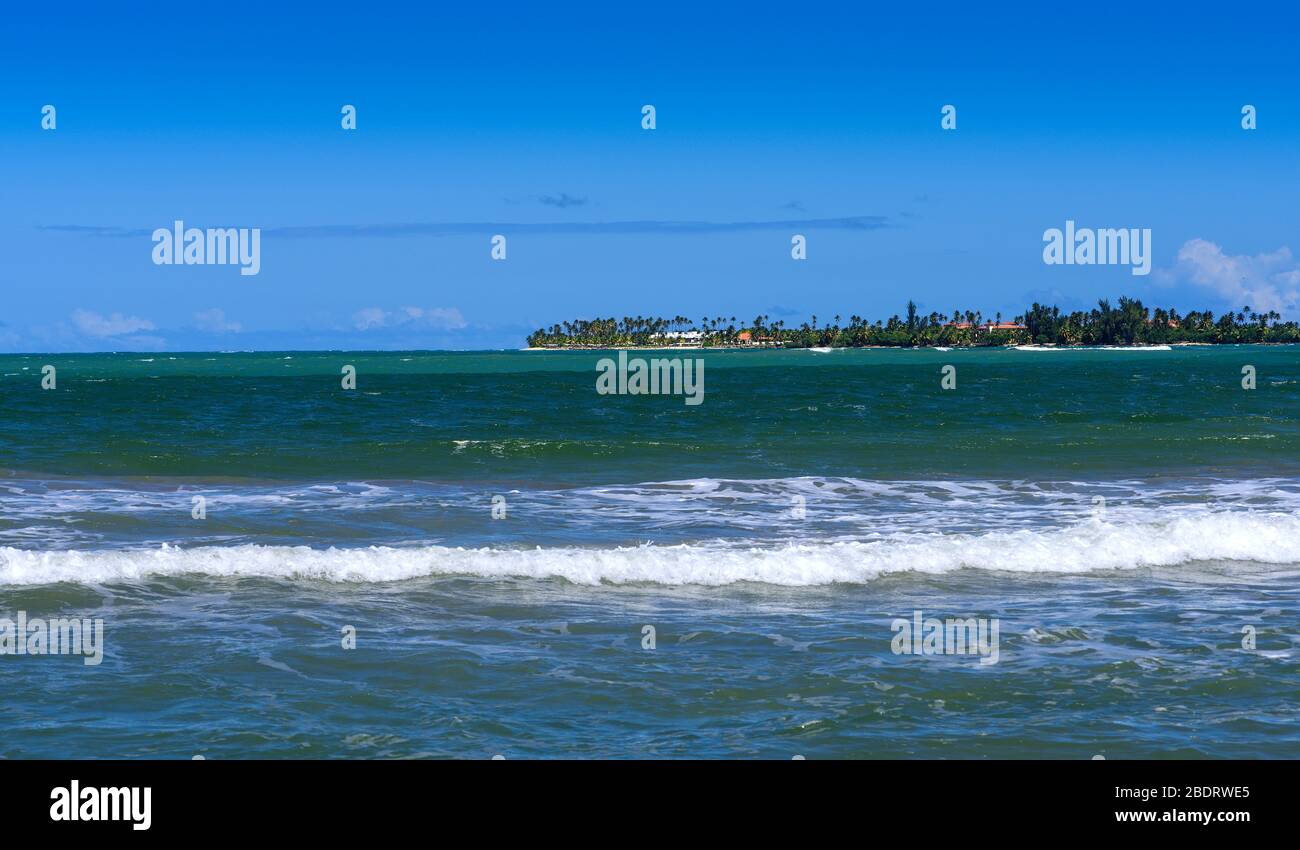 Sunny tropical beach and Atlantic Ocean waves on the island of Puerto ...