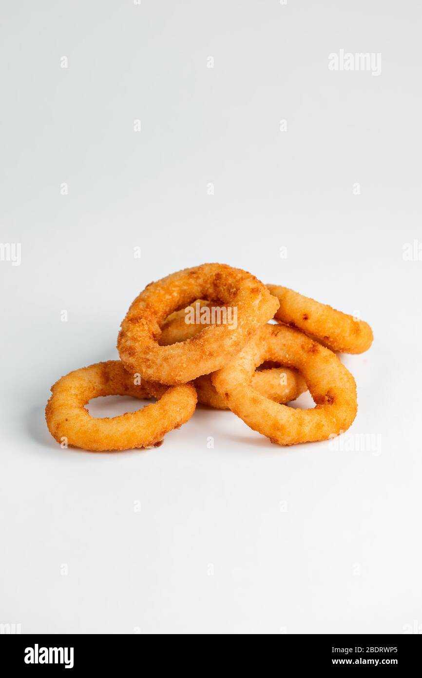 onion rings in white background Stock Photo - Alamy