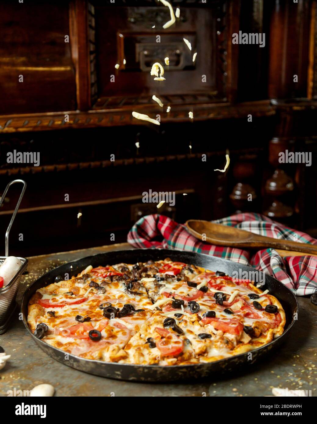 mixed pizza with meat and chicek olive tomato and cheese Stock Photo ...