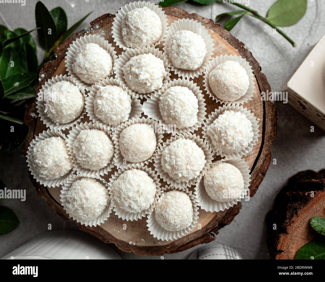 pastry balls encrusted with coconut sprinkles Stock Photo - Alamy