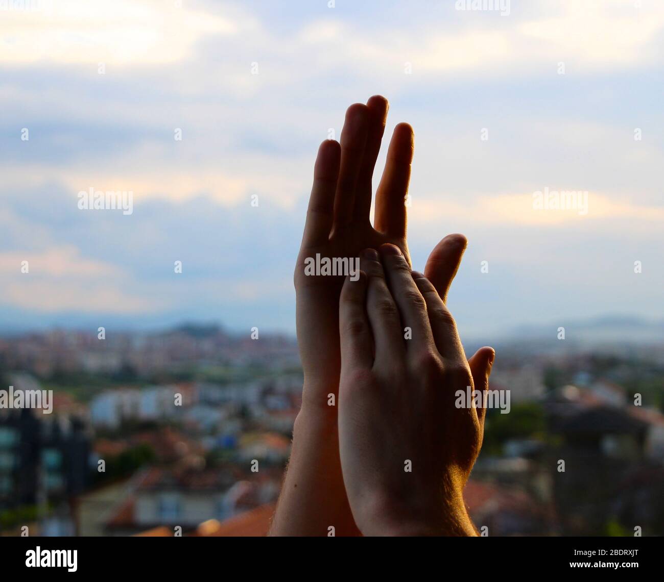 Clapping hands hi-res stock photography and images - Alamy