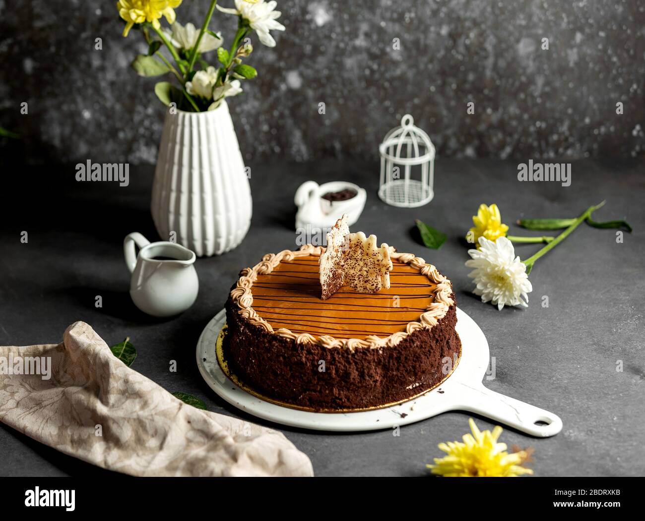 snickers cake with caramel syrup top Stock Photo - Alamy