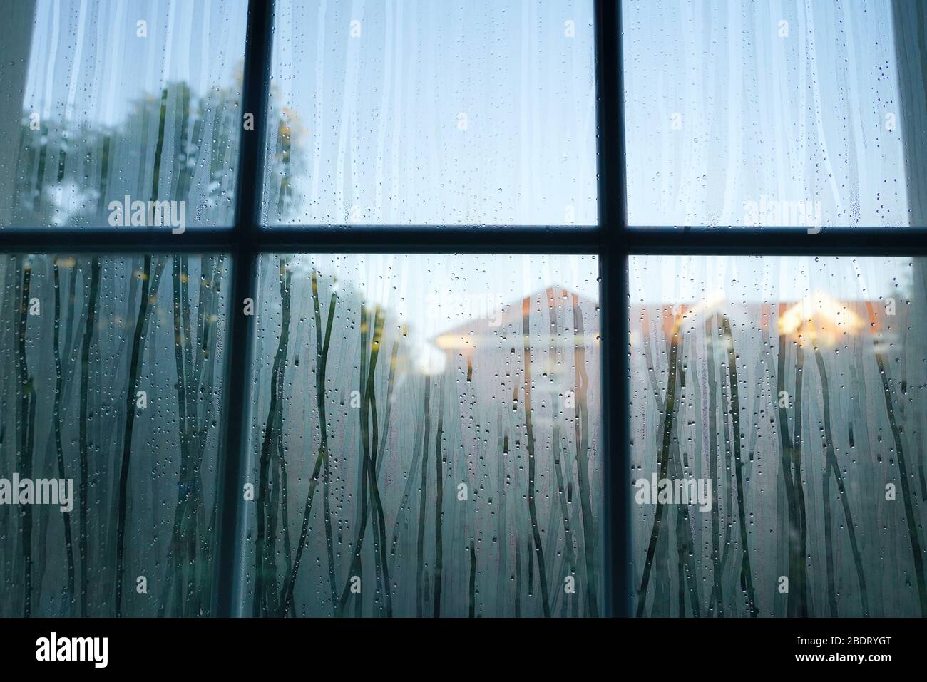 Look through the window of the rain the weather clears villa Stock ...