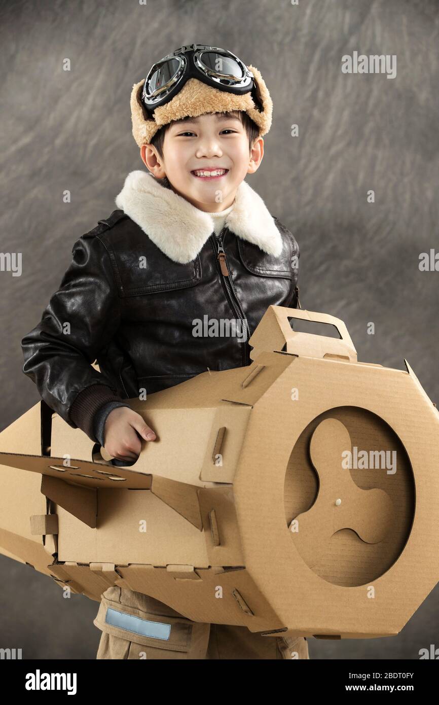 Happy children's driving paper airplanes Stock Photo - Alamy