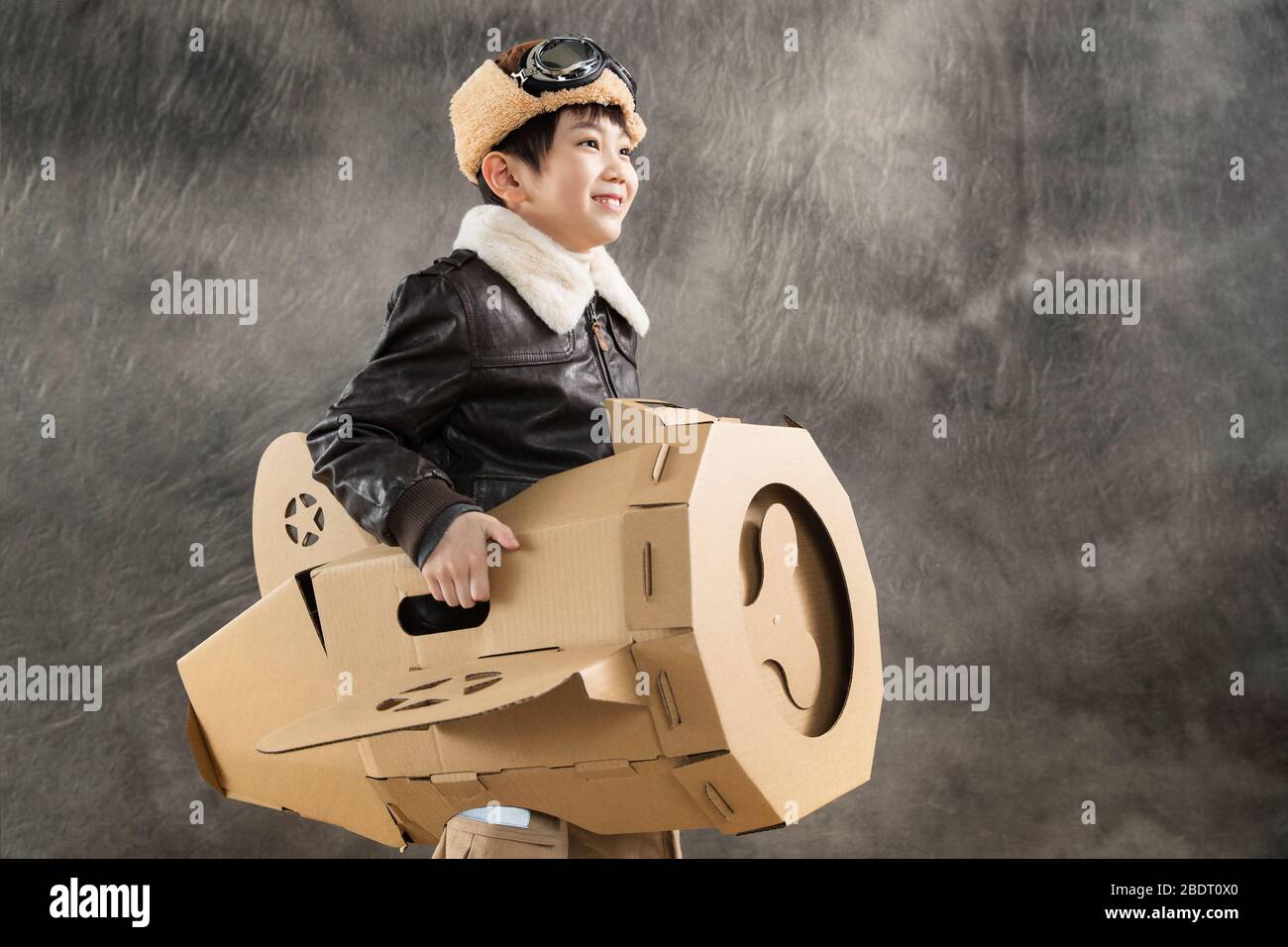 Happy children's driving paper airplanes Stock Photo - Alamy