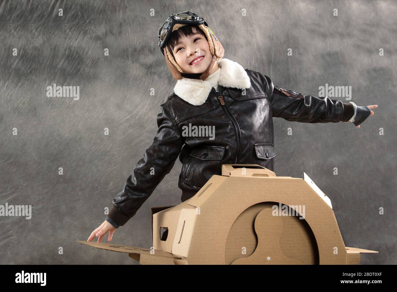 Happy children's driving paper airplanes Stock Photo - Alamy
