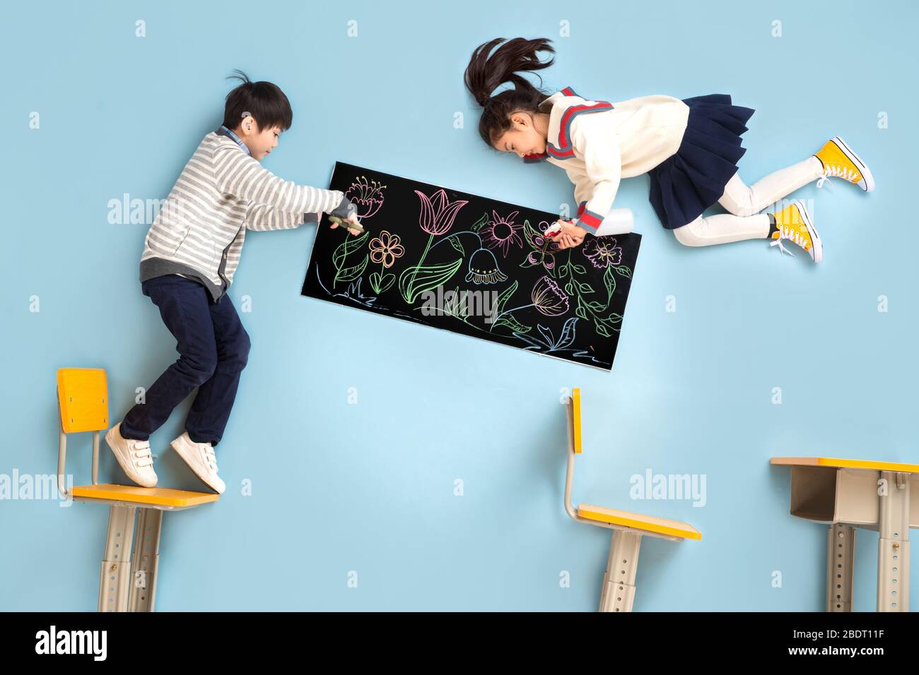 Happy children imagine cut flowers plant Stock Photo - Alamy