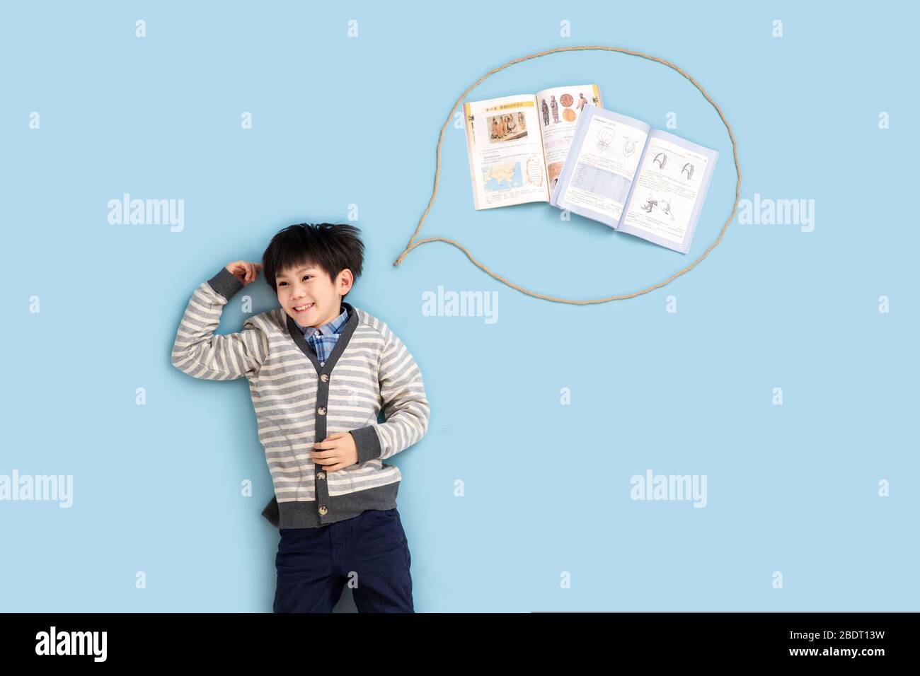 Want to learn the happy boy Stock Photo - Alamy
