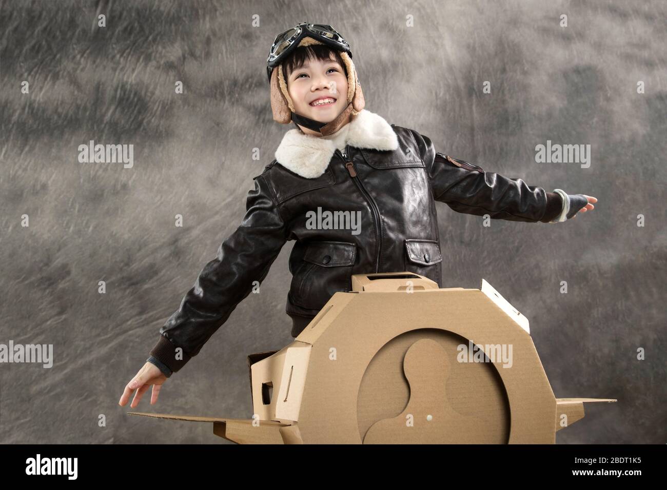 Happy children's driving paper airplanes Stock Photo - Alamy