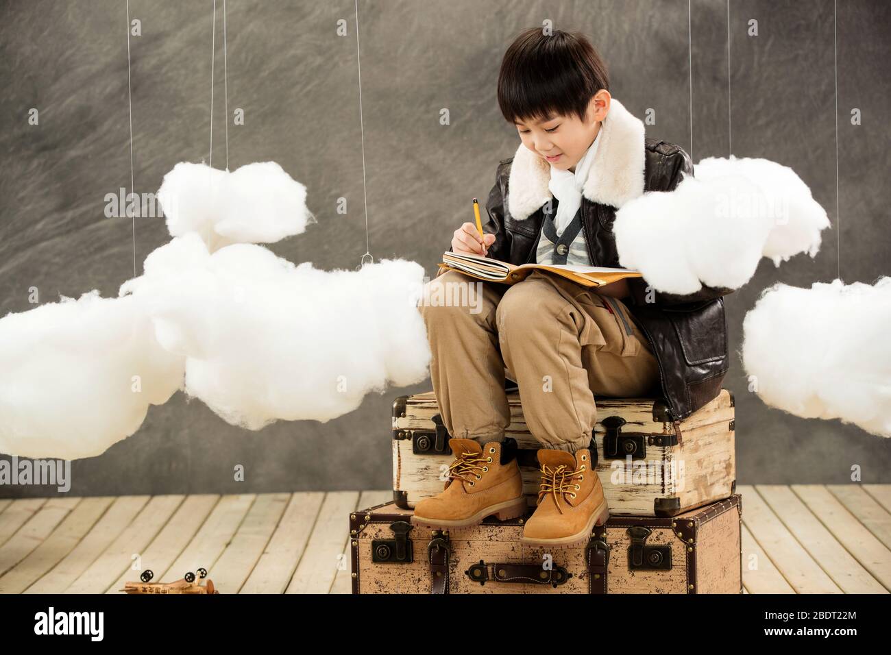 Boy writing diary hi-res stock photography and images - Alamy