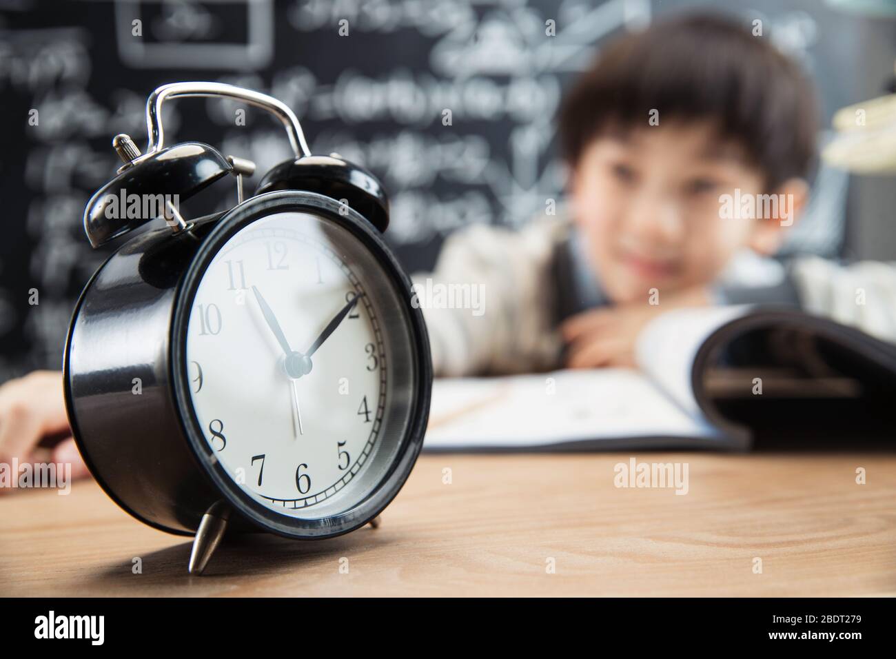 The alarm clock on the table Stock Photo - Alamy