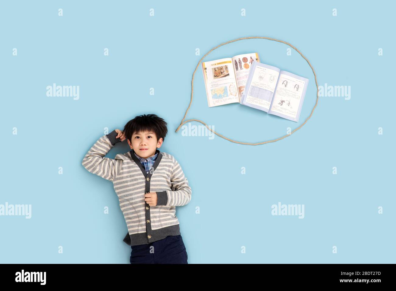 Want to learn the happy boy Stock Photo - Alamy