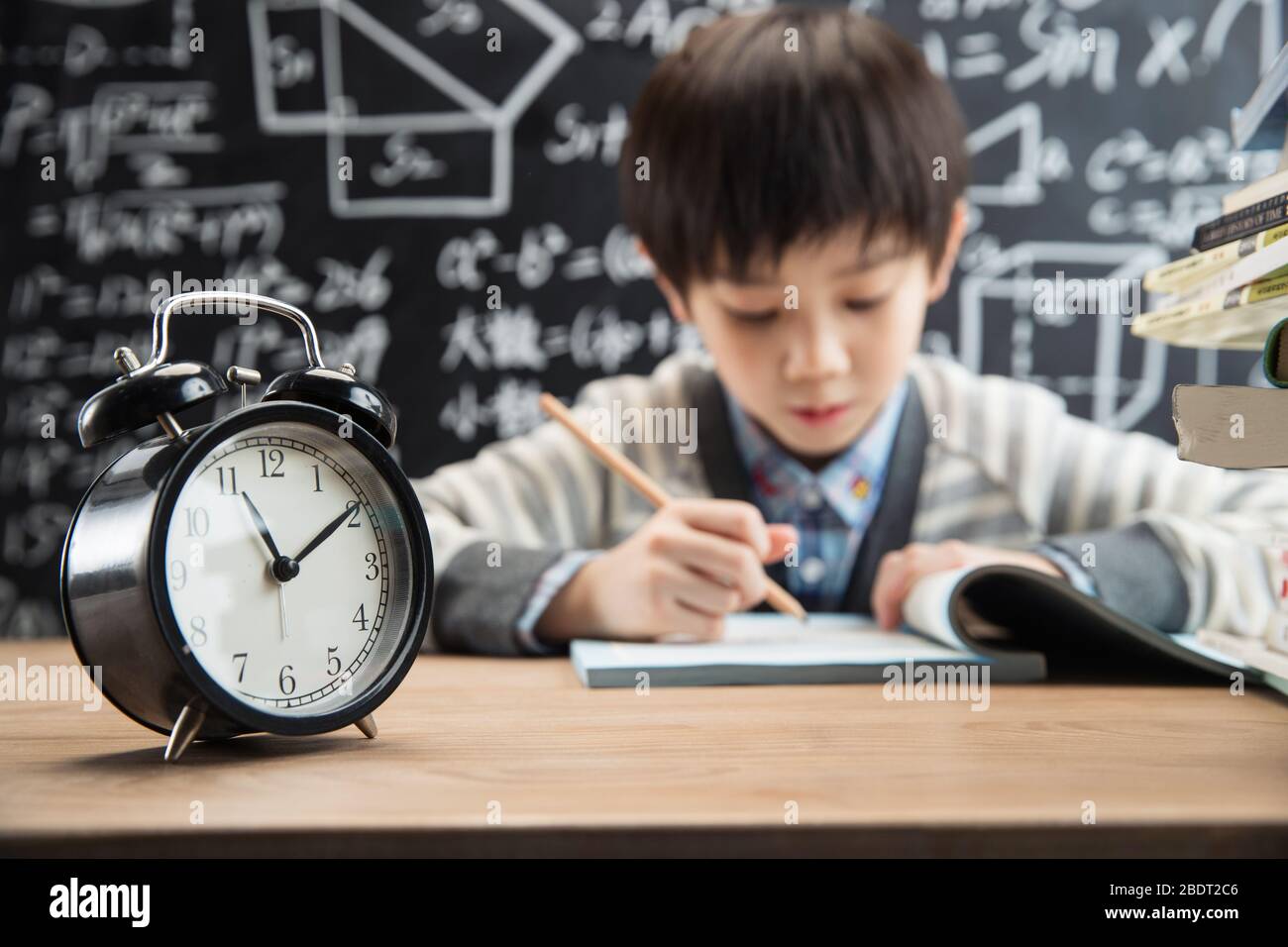 In the evening homework primary school boys Stock Photo - Alamy