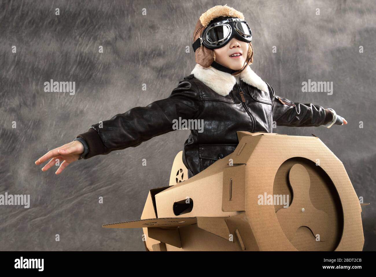 Happy children's driving paper airplanes Stock Photo - Alamy