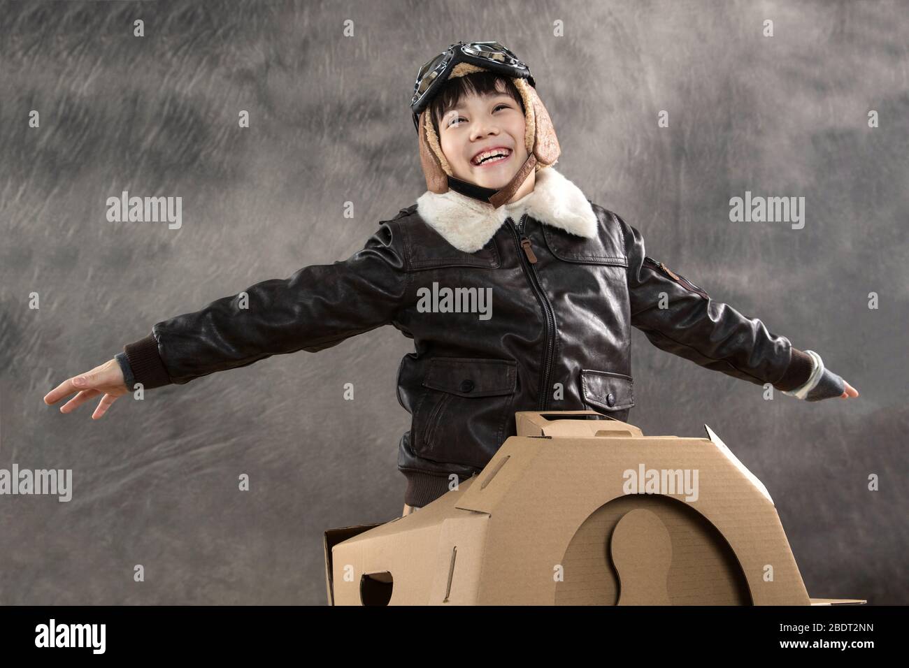 Happy children's driving paper airplanes Stock Photo - Alamy