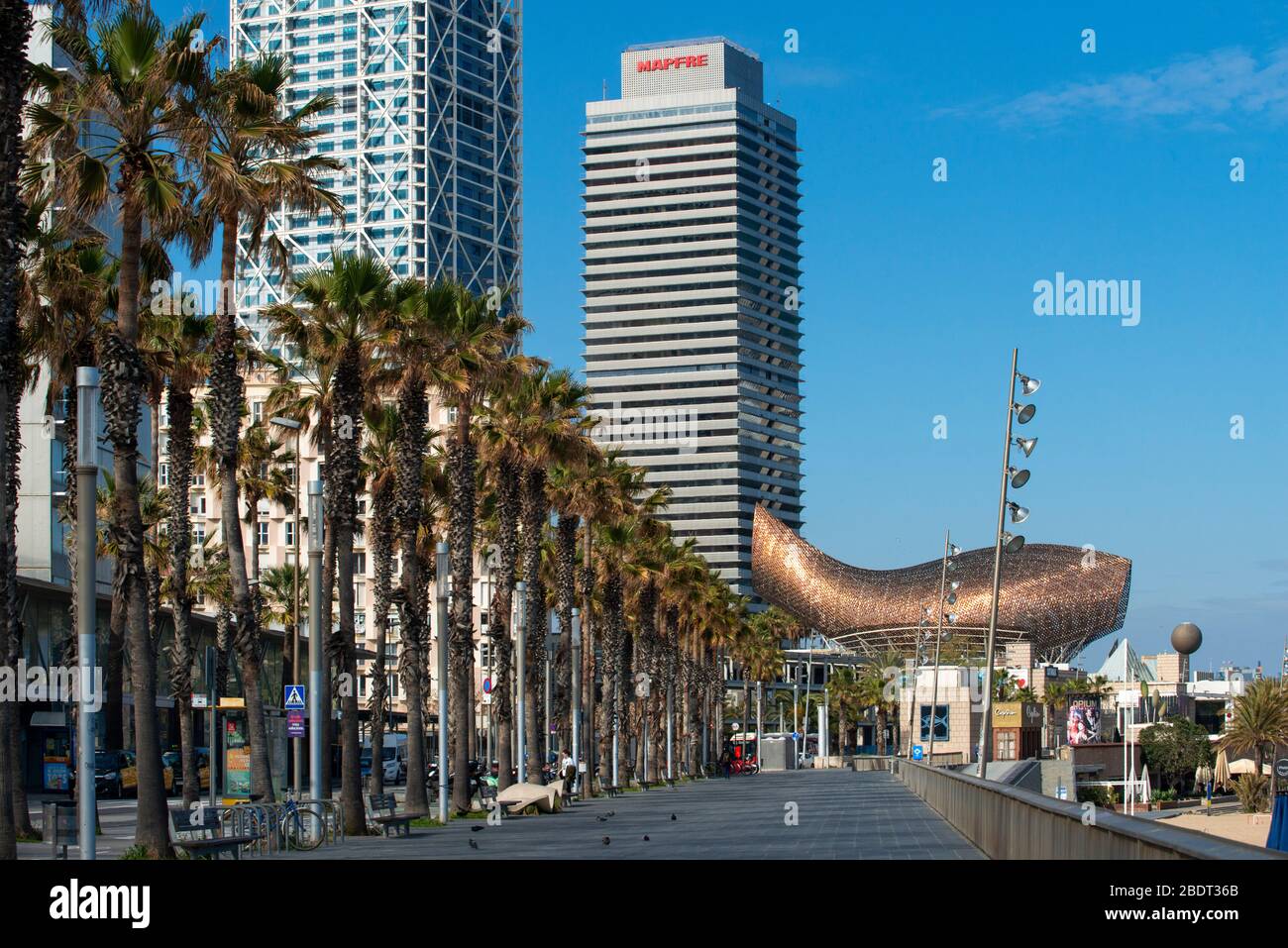 Mapfre tower and seafront promenade in Barceloneta Barcelona is ...