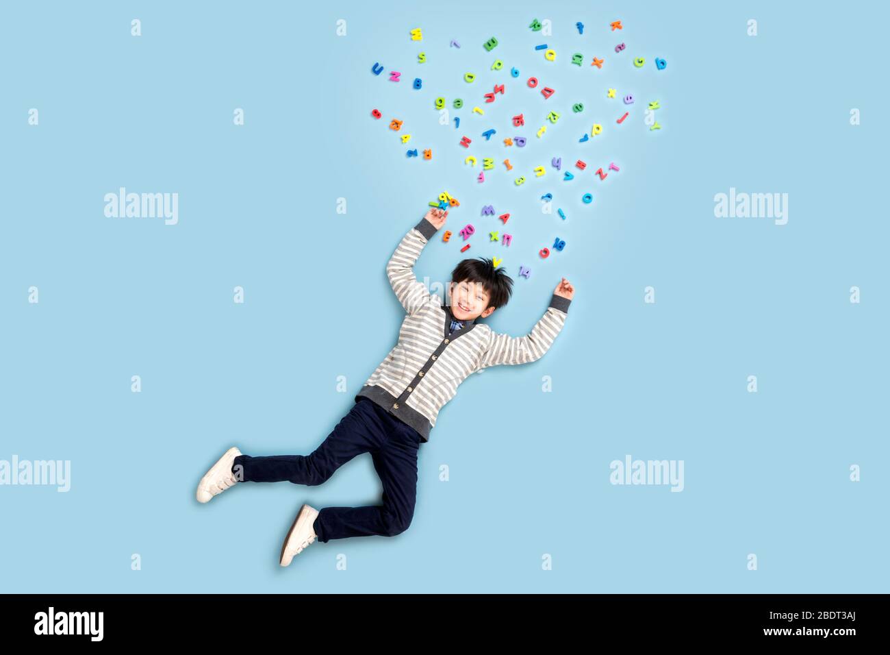 Happy learning boy letters and Numbers Stock Photo - Alamy