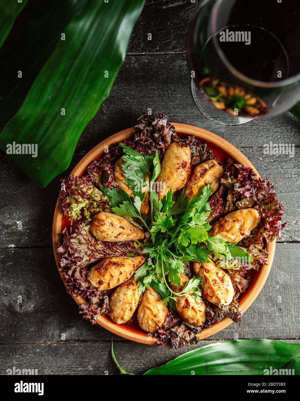 top view of fried gurza served with parsley and lettuce Stock Photo - Alamy