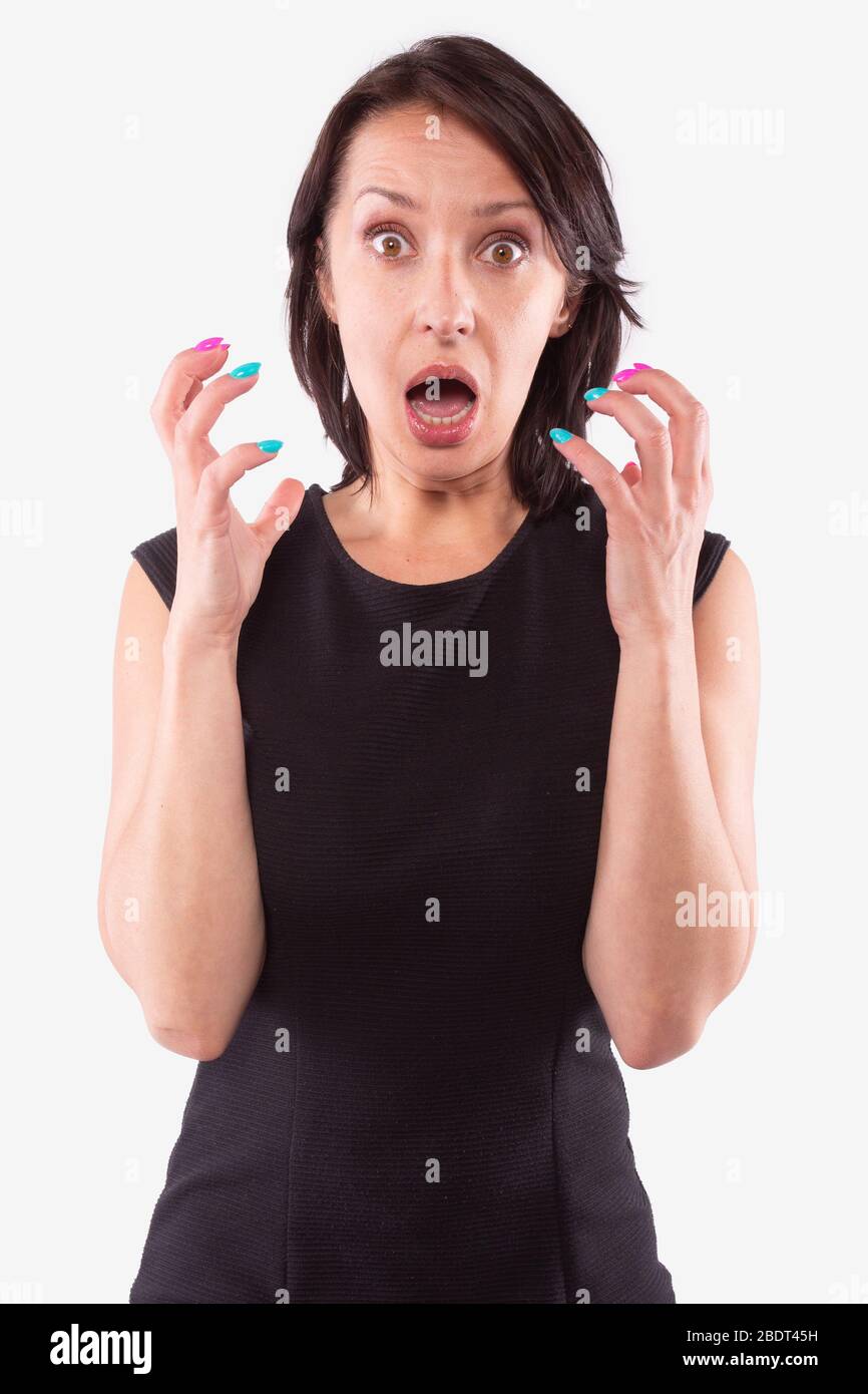 Shocked horrified woman with round eyes, opened mouth. White background ...