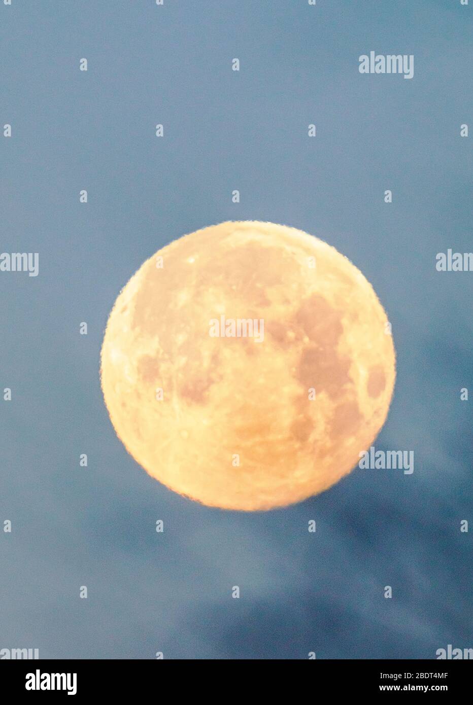 Full pink super moon setting over Rocky Mountains, Salida, Colorado ...