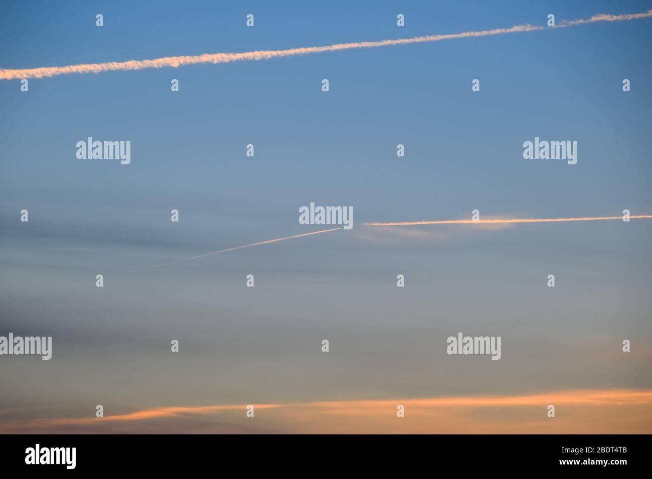 Pink contrail hi-res stock photography and images - Alamy