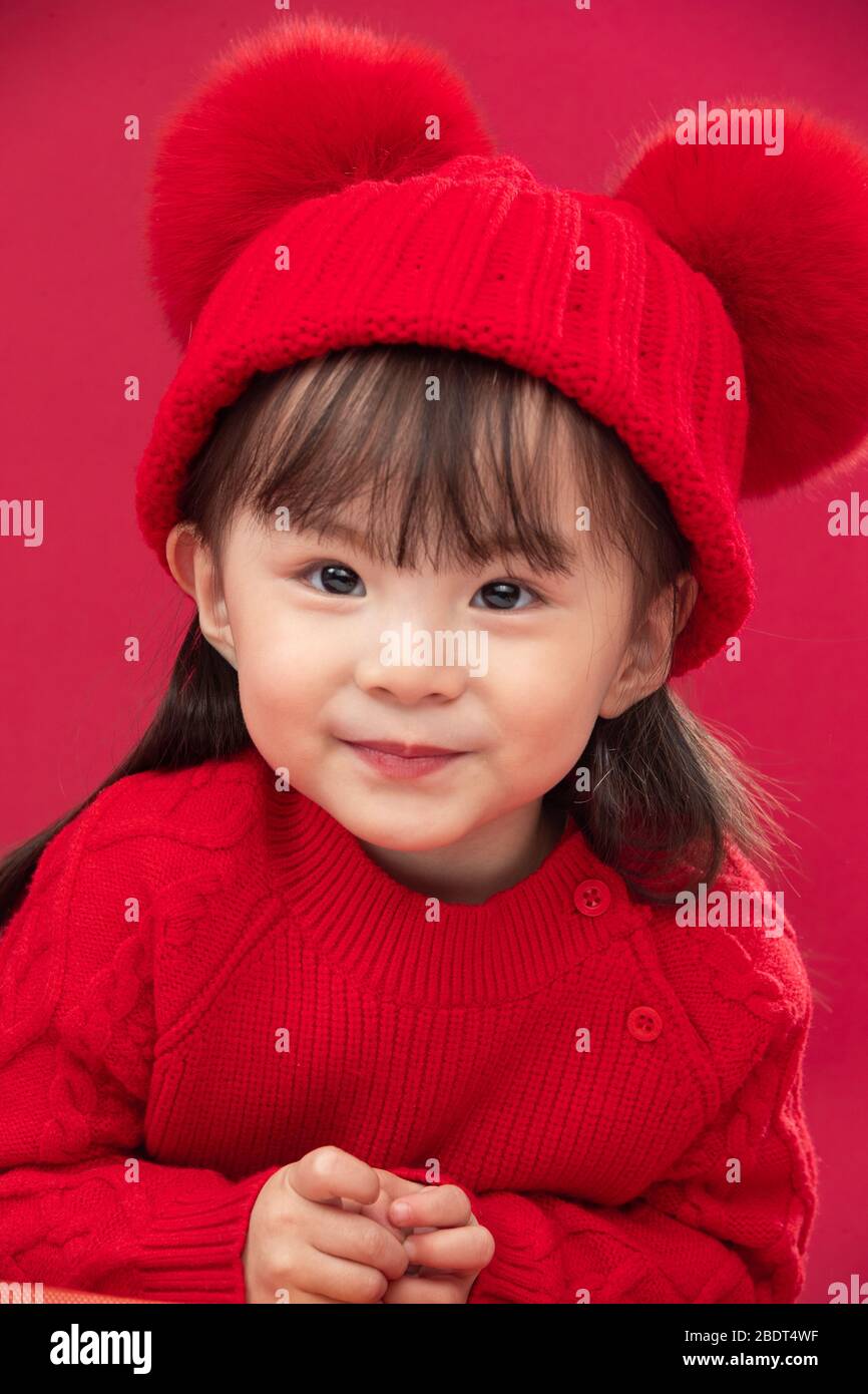 Happy little girl bust features Stock Photo - Alamy