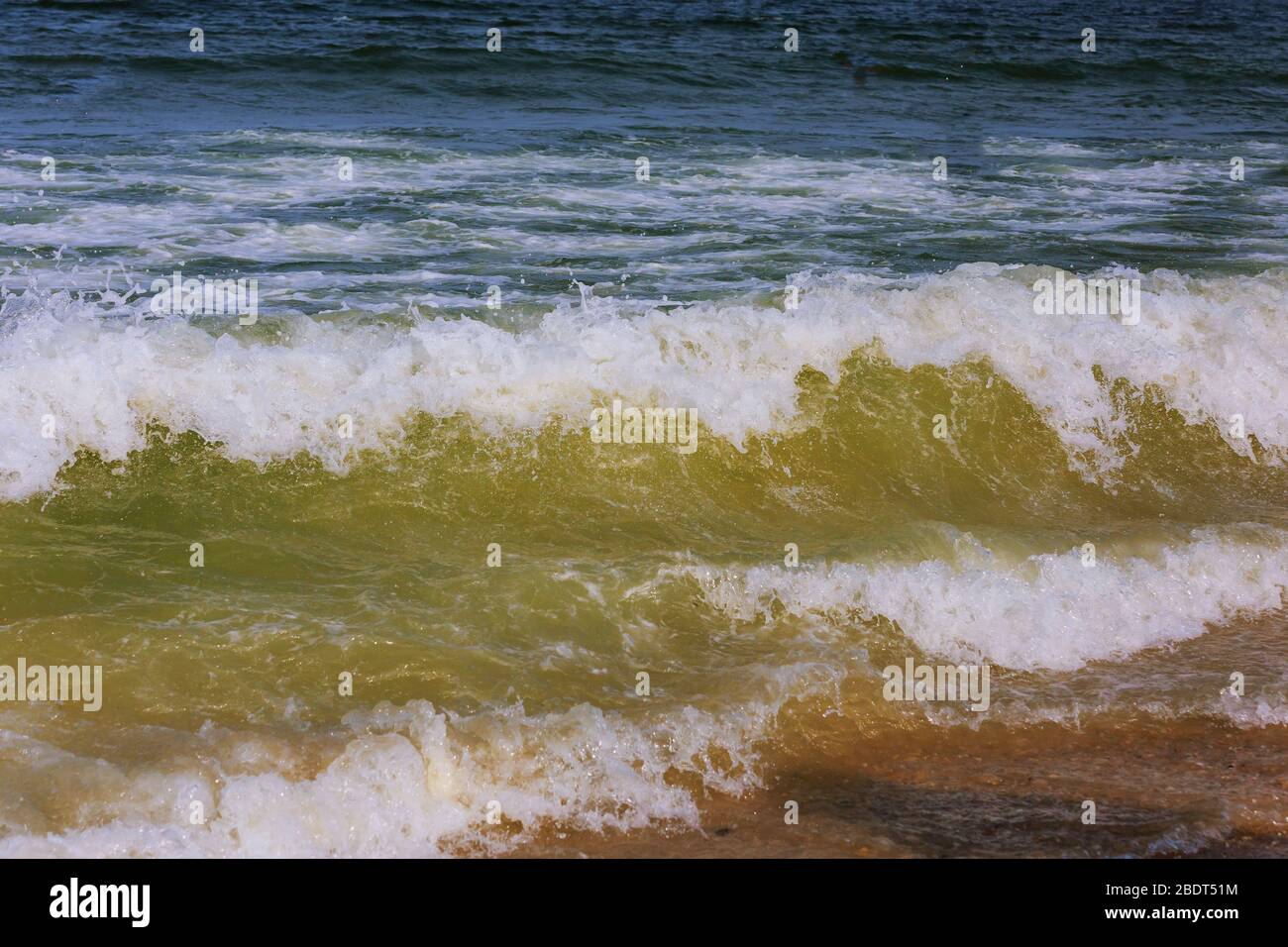 Blue water ocean wave blue swells crashing curling breaking a wavy ...