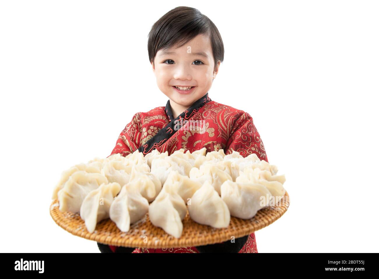 The little boy Chinese New Year pack dumpling Stock Photo - Alamy