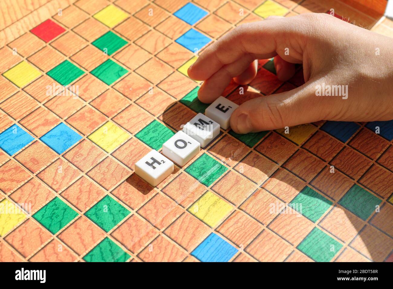 Moscow, Russia - April 09, 2020: Scrabble game letters. Child set word ...