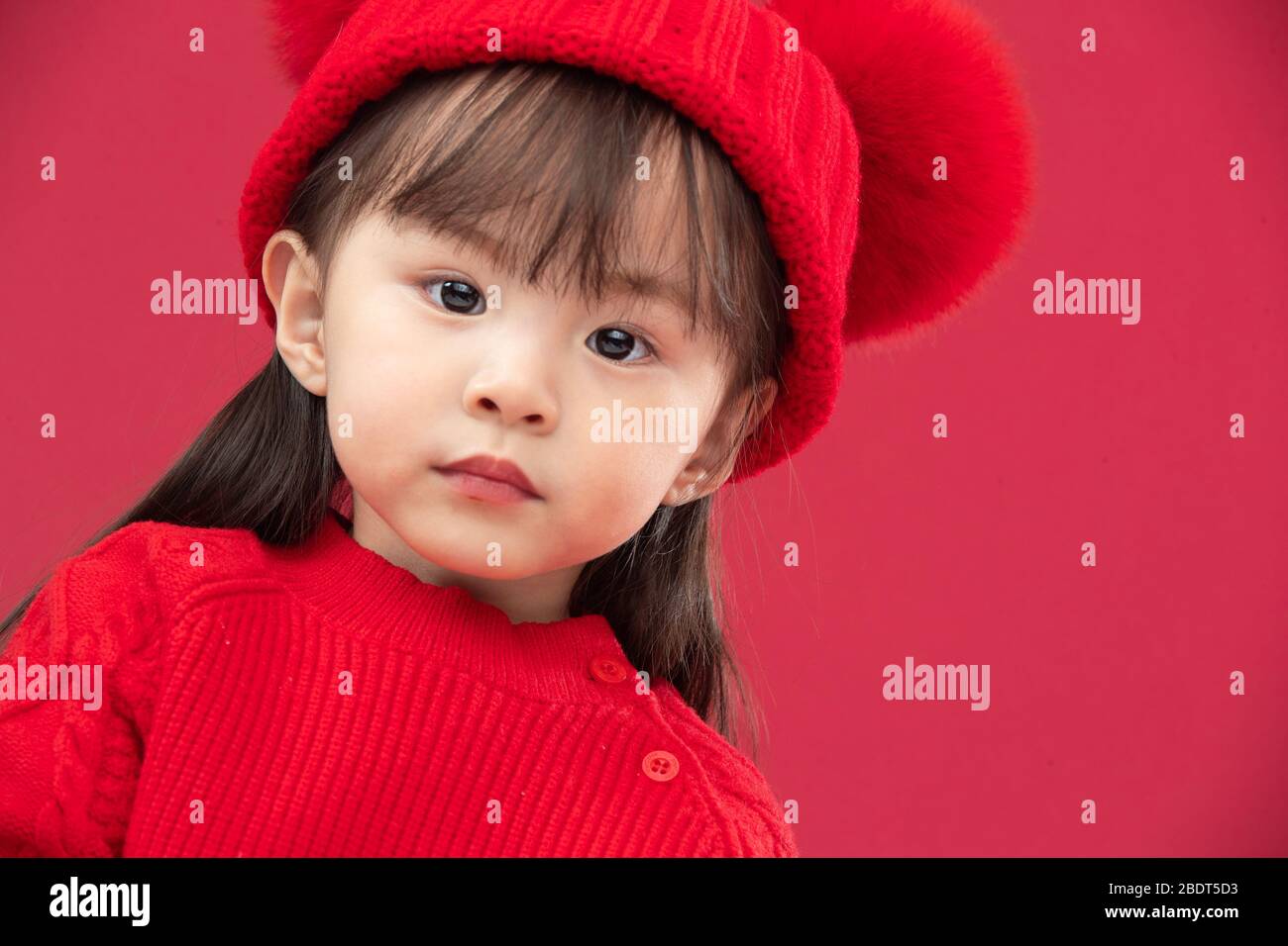 Happy little girl bust features Stock Photo - Alamy
