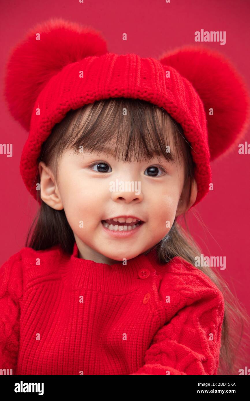 Happy little girl bust features Stock Photo - Alamy