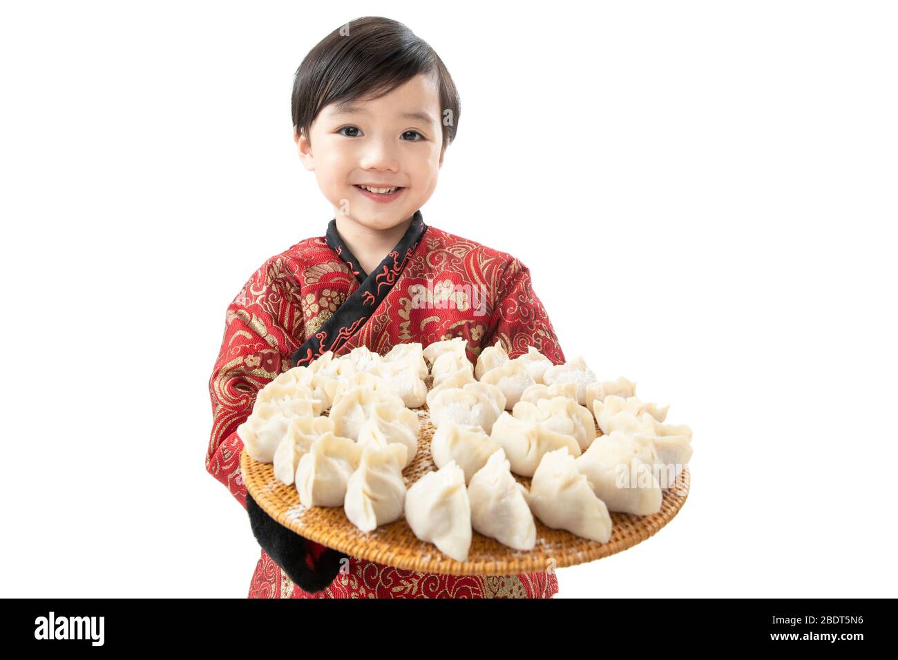 The little boy Chinese New Year pack dumpling Stock Photo - Alamy