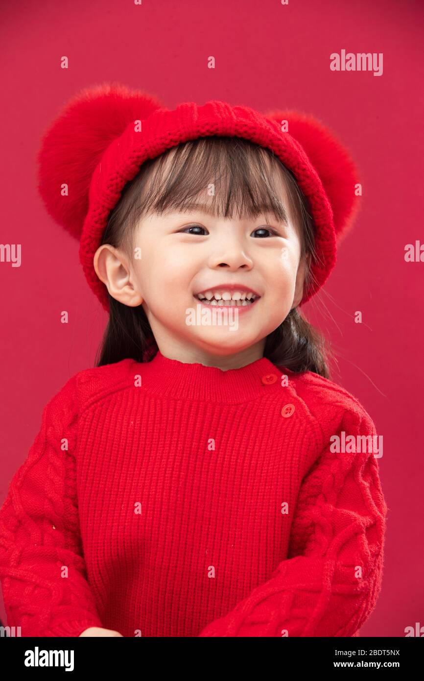 Happy little girl bust features Stock Photo - Alamy