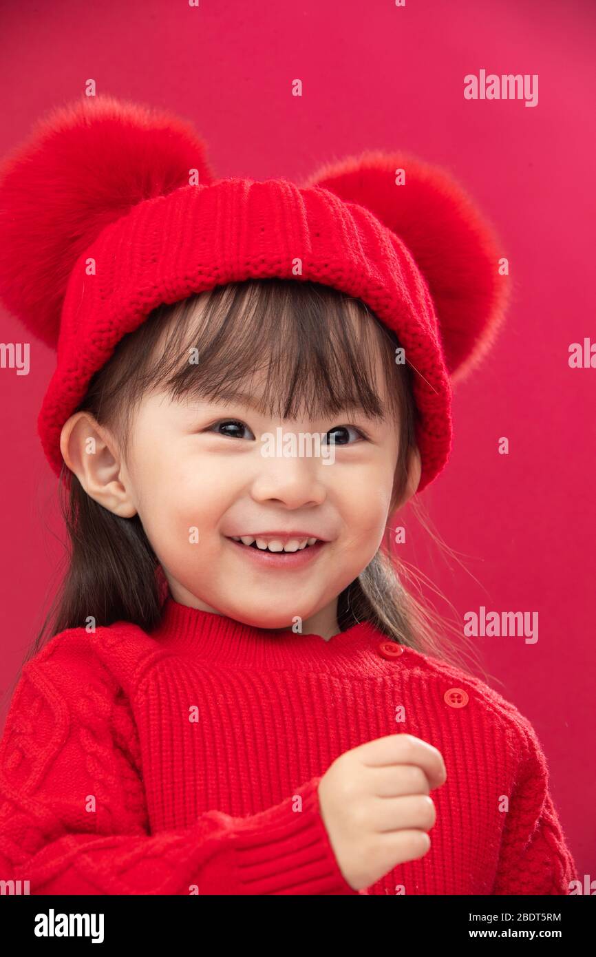 Happy little girl bust features Stock Photo - Alamy